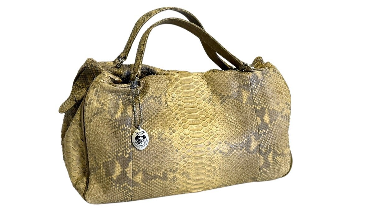 Yahoo!オークション - 未使用 WEL ウェル パイソン使用2WA巾着型バッグ...