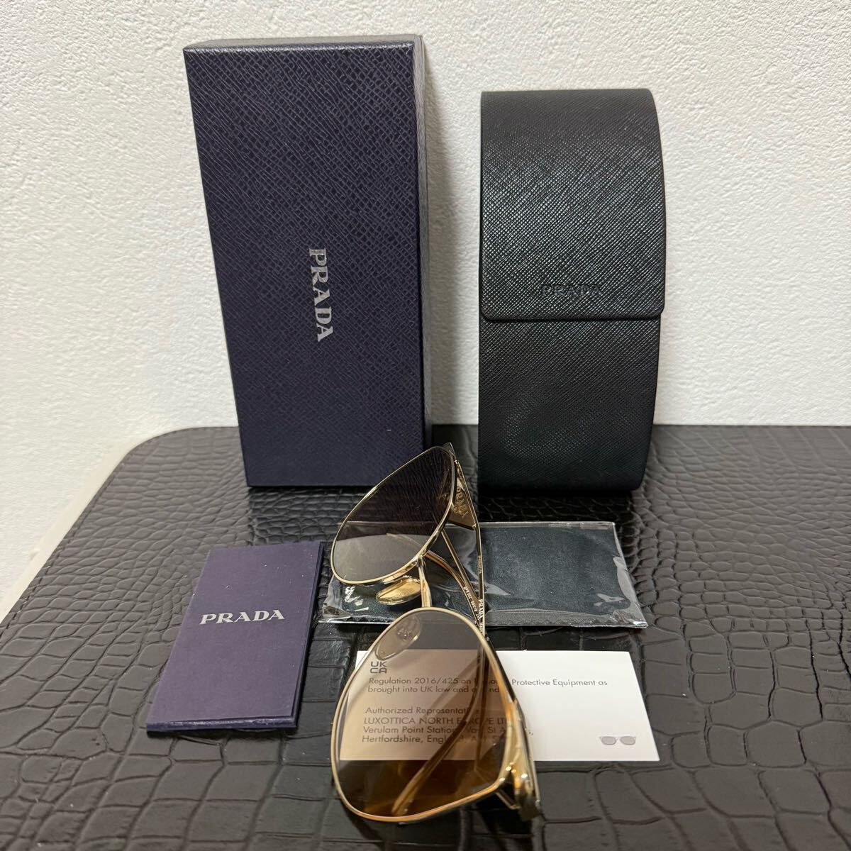 PRADA プラダ シンボルサングラス ゴールドフレームブラウン PRADA プラダ シンボルサングラス ゴールドフレームブラウン
