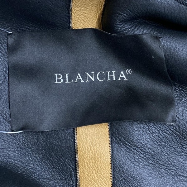 Yahoo!オークション - ブランカ BLANCHA ポンチョ サイズ38 M - 黒×ベ...