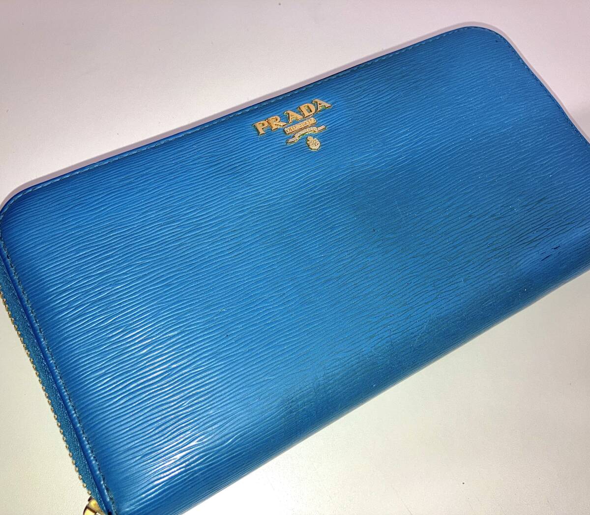 PRADA ラウンドファスナー 長財布 ブルー サファイアーノレザー PRADA ラウンドファスナー 長財布 ブルー サファイアーノレザー