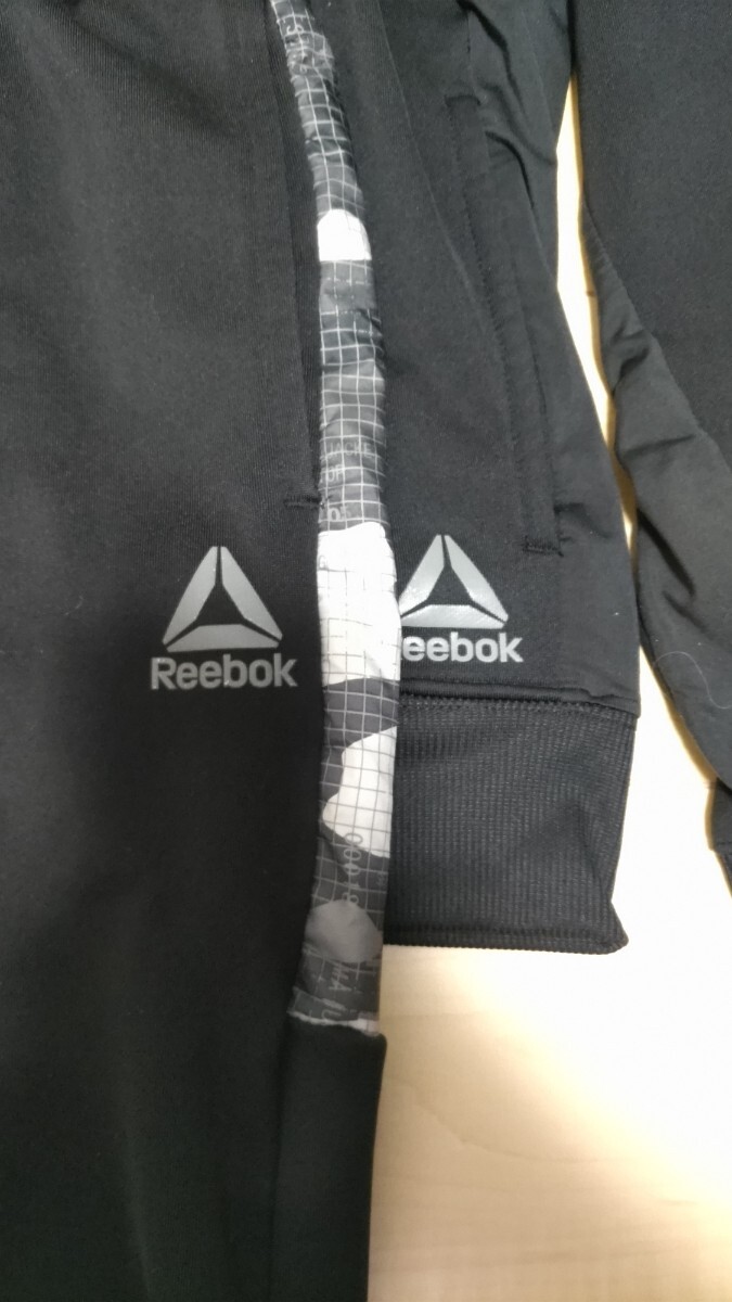 リーボック Reebok セットアップ 上下セット XO 黒 ブラック リーボック Reebok セットアップ 上下セット XO 黒 ブラック