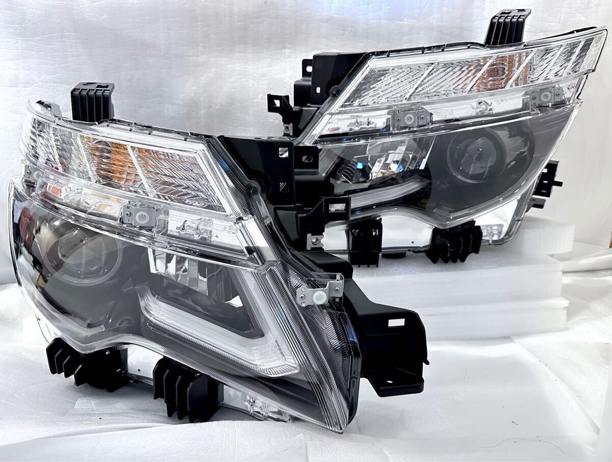 / 日産純正 E52 エルグランド 後期 中期 LED ヘッドライト KOITO 100-23674 ブラックダーククローム PE52 PNE52 TE52 TNE52 左右(ヘッドライト ...