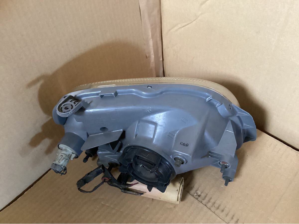 Yahoo!オークション - 日産マーチ 1998年式 E-K11 左ライト(ICHIKOH156...