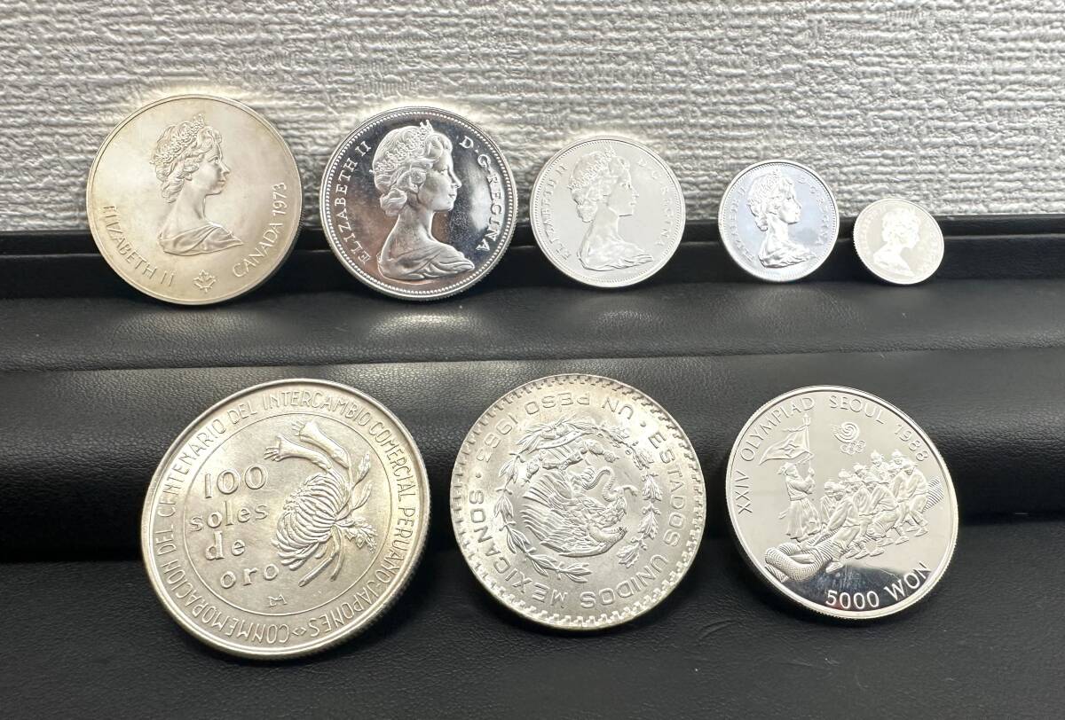 Yahoo!オークション - ♯35466A 外国銭 銀貨 8枚 122g オリンピック ウ...