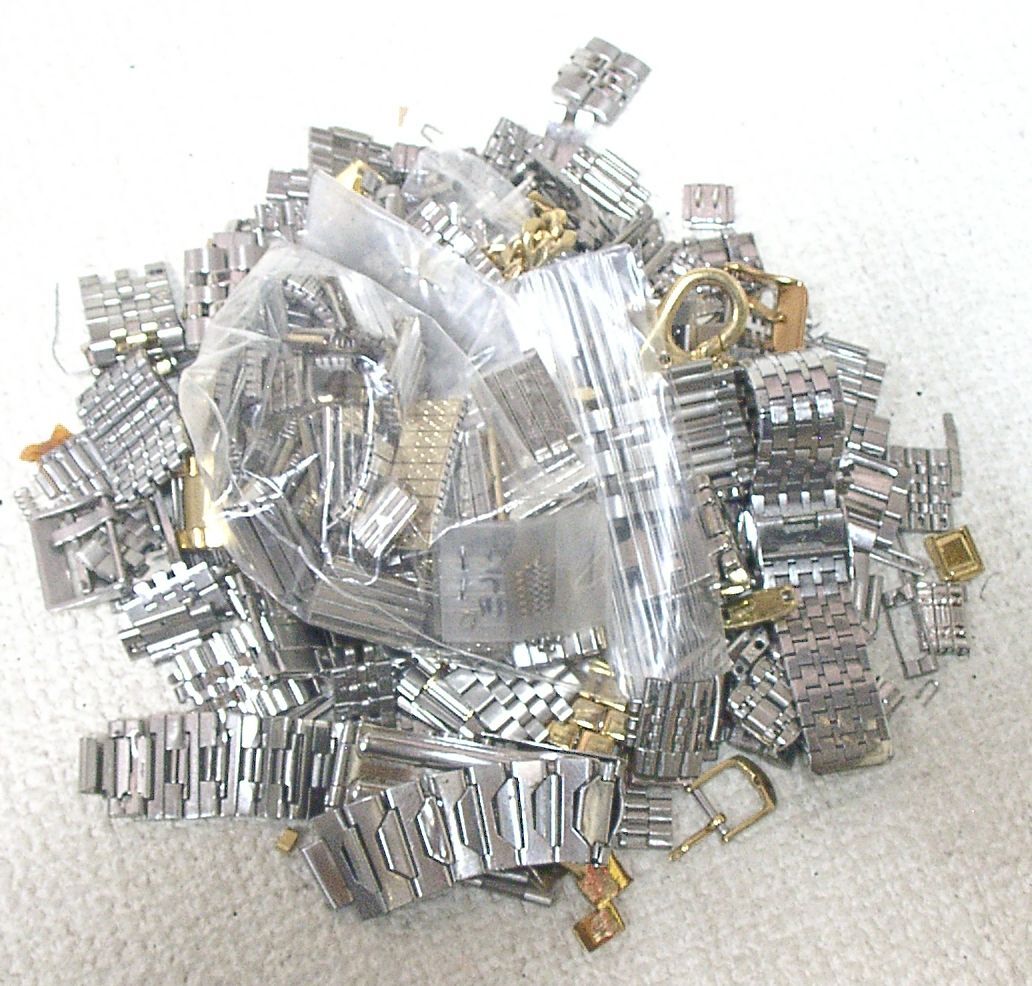 Yahoo!オークション - 金属時計バンドの部品 コマ ピンなど580g 617