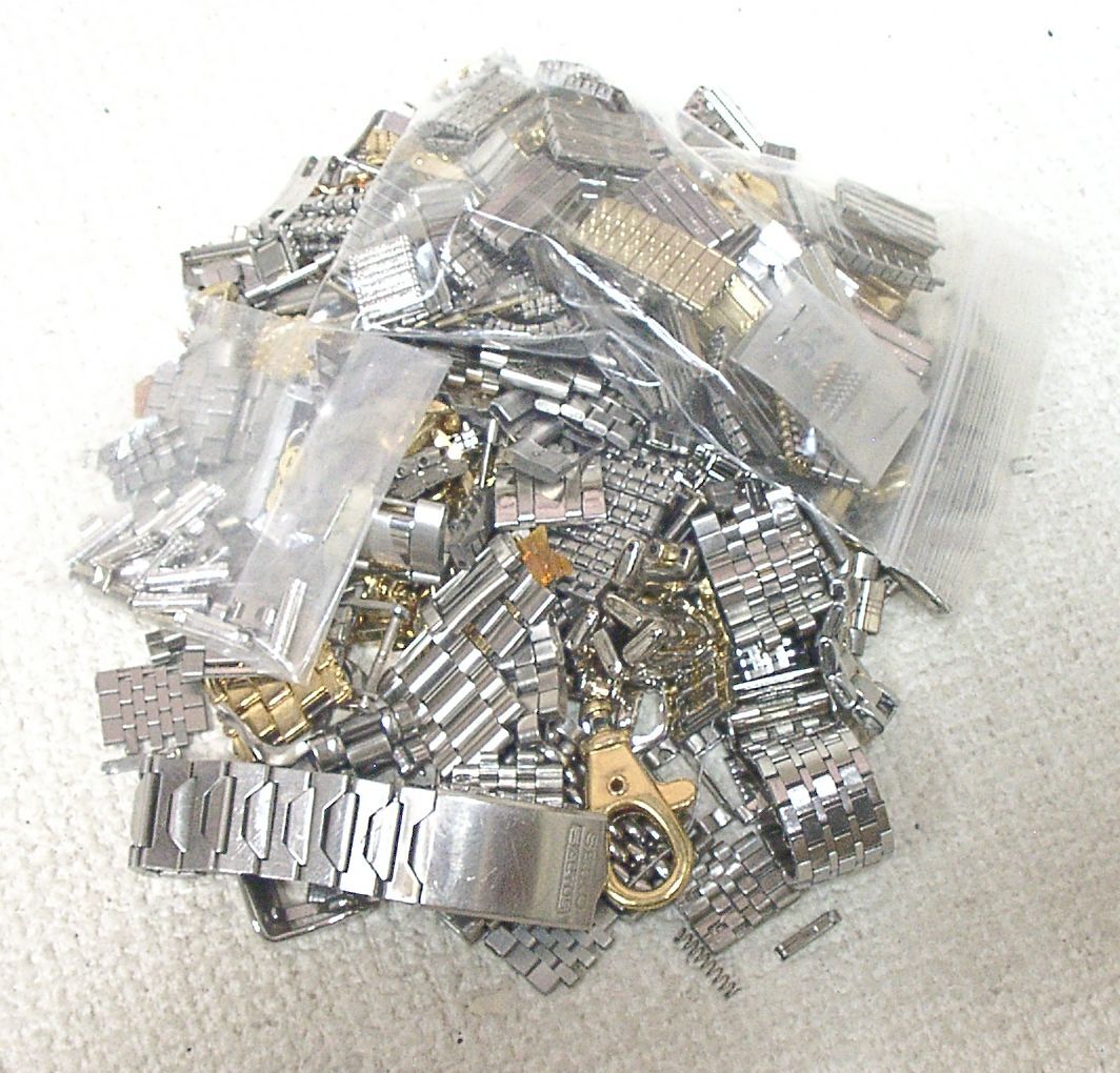 Yahoo!オークション - 金属時計バンドの部品 コマ ピンなど580g 617