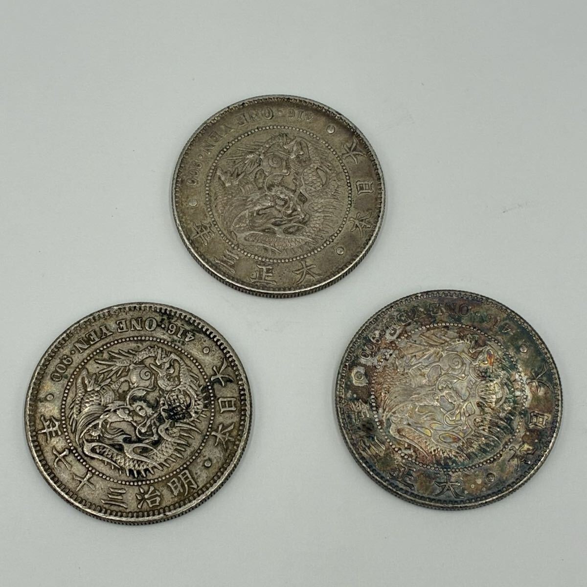 Yahoo!オークション - 1円スタート 古銭 一圓 旧硬貨 菊 紋章 明治 大...