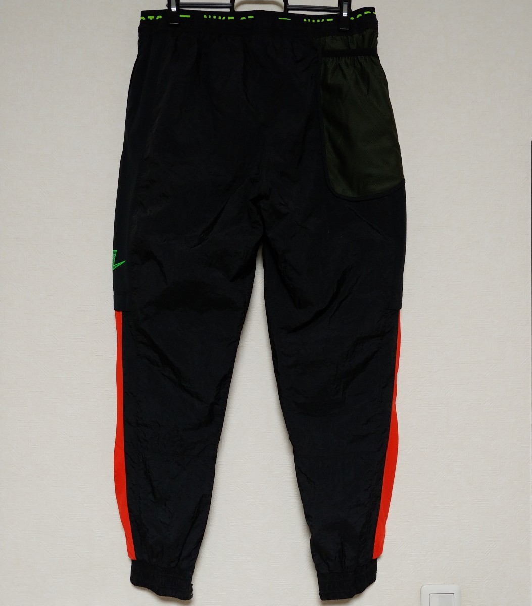 未使用 NIKE ナイロン ジャケット パンツ セットアップ 黒×蛍光 未使用 NIKE ナイロン ジャケット パンツ セットアップ 黒×蛍光