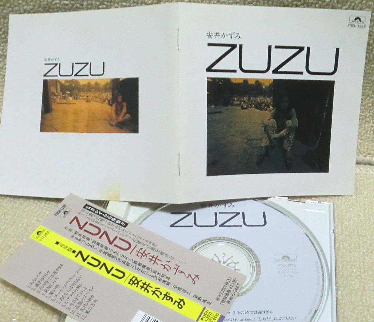 Yahoo!オークション - 即決 送料210円 CD 安井かずみ 追悼盤 ZUZU 帯 ...