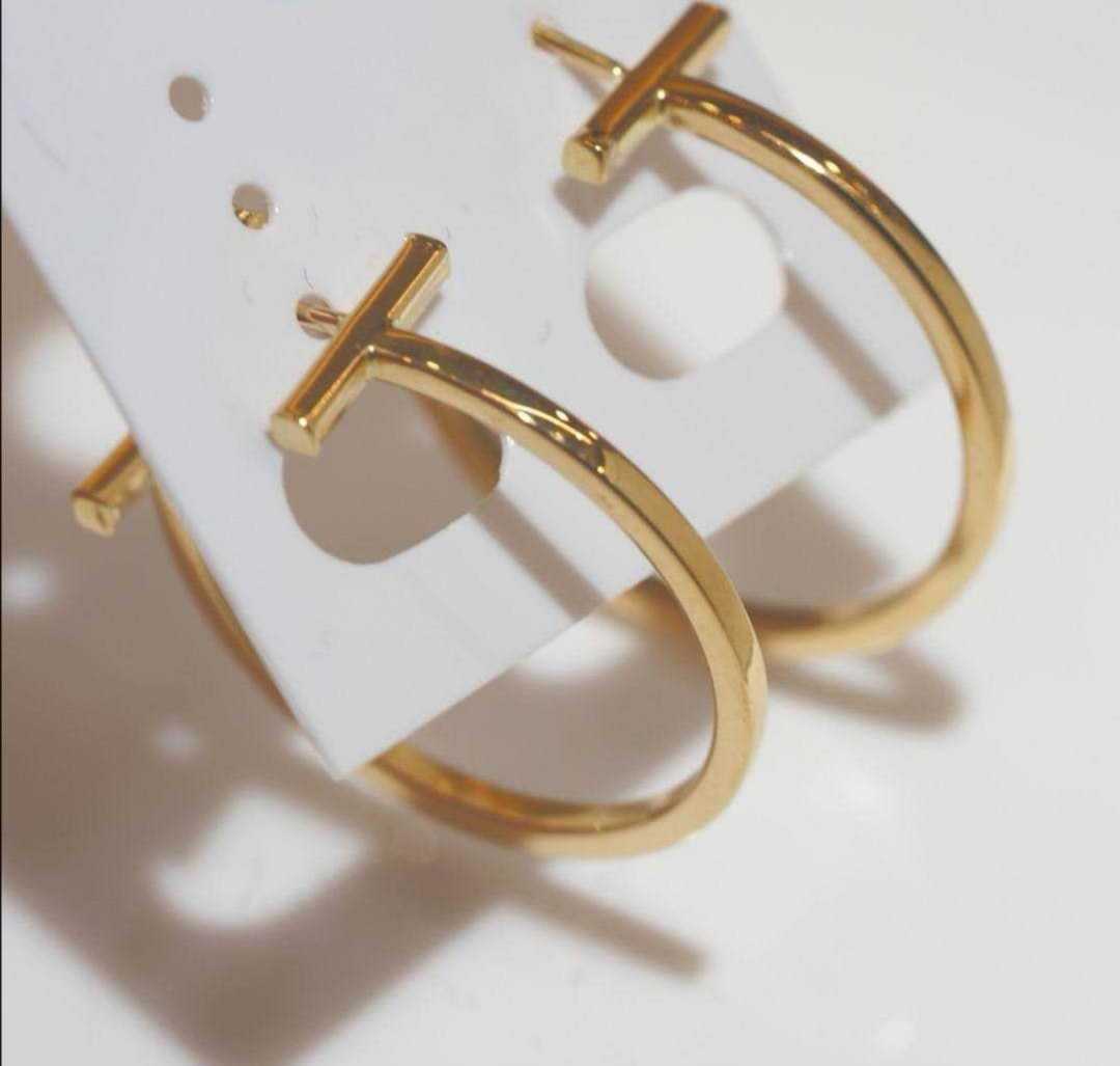 Yahoo!オークション - s110 新品 「T」フープピアス K18YG 20mm