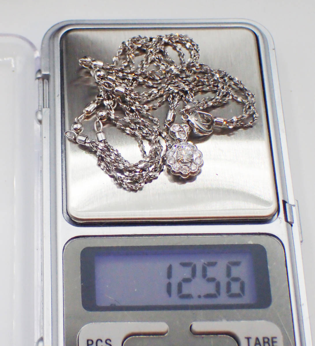 Yahoo!オークション - Pt850 プラチナ 天然ダイヤ0.31ct ダイヤ0.47ct ...