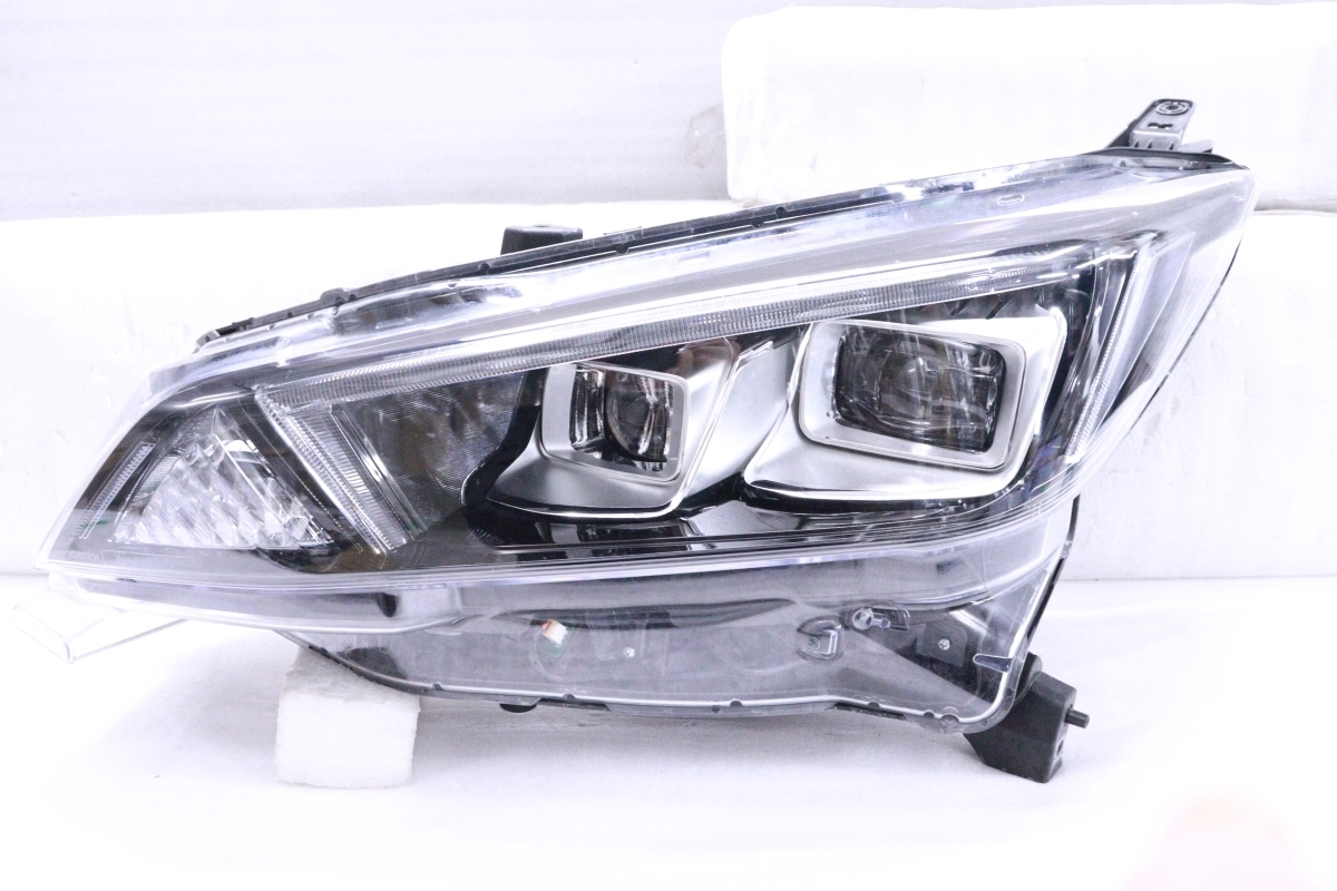Yahoo!オークション - 31-1394 美品 LED ZE1 リーフ 左ヘッドライト IC...