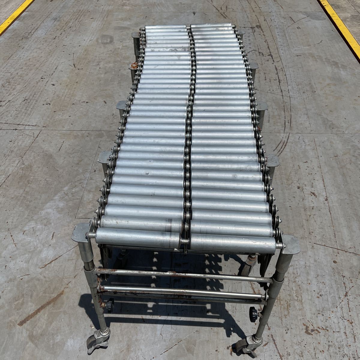 Yahoo!オークション - 伸縮ローラーコンベヤ 長さ390m中古品