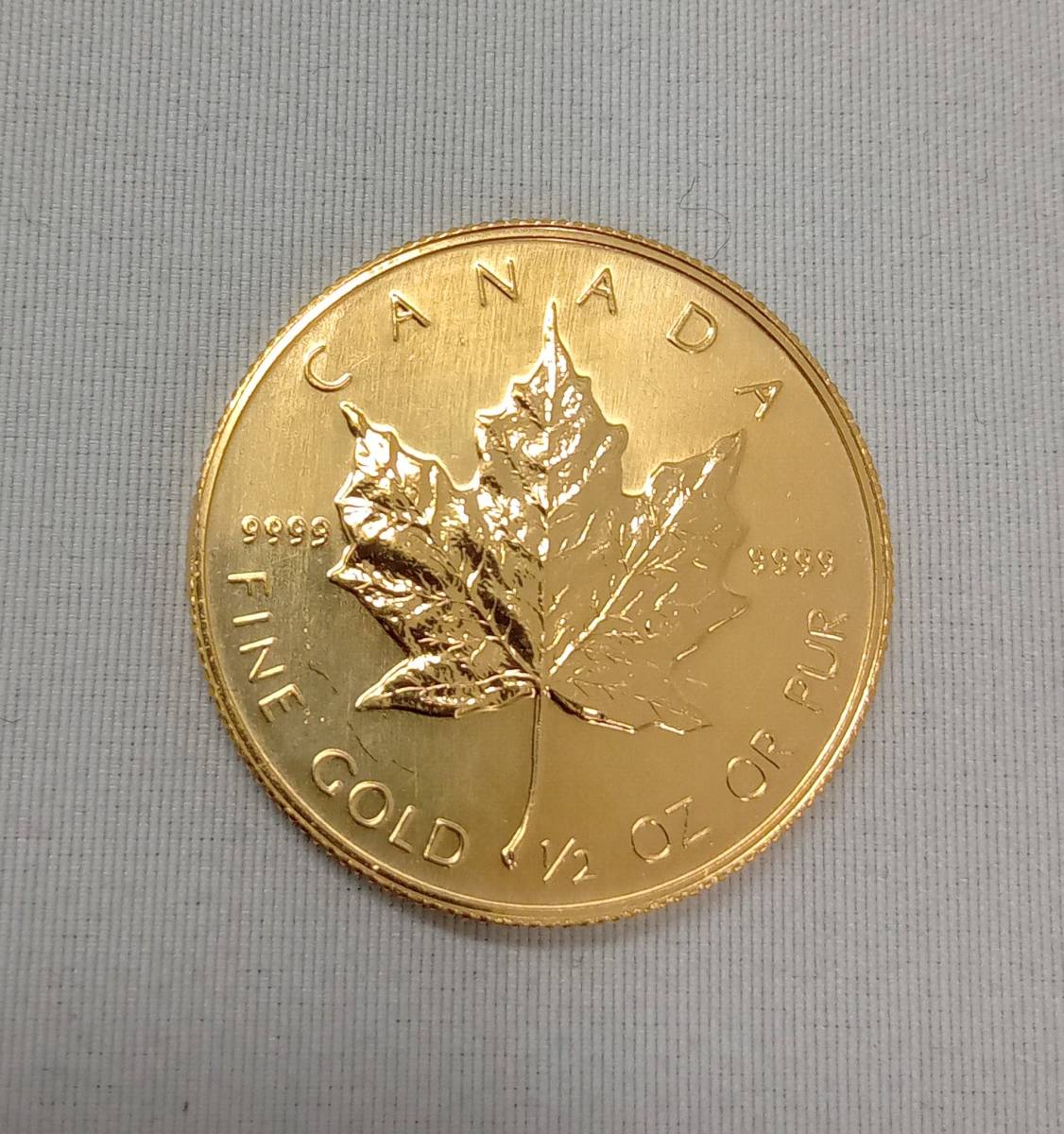 Yahoo!オークション - K24 1/2oz メイプルリーフ金貨 コイン 15.5g ゴ...