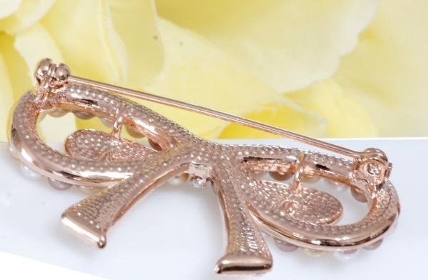 Yahoo!オークション - 18KRGPゴールドパールリボン ブローチ gx5084