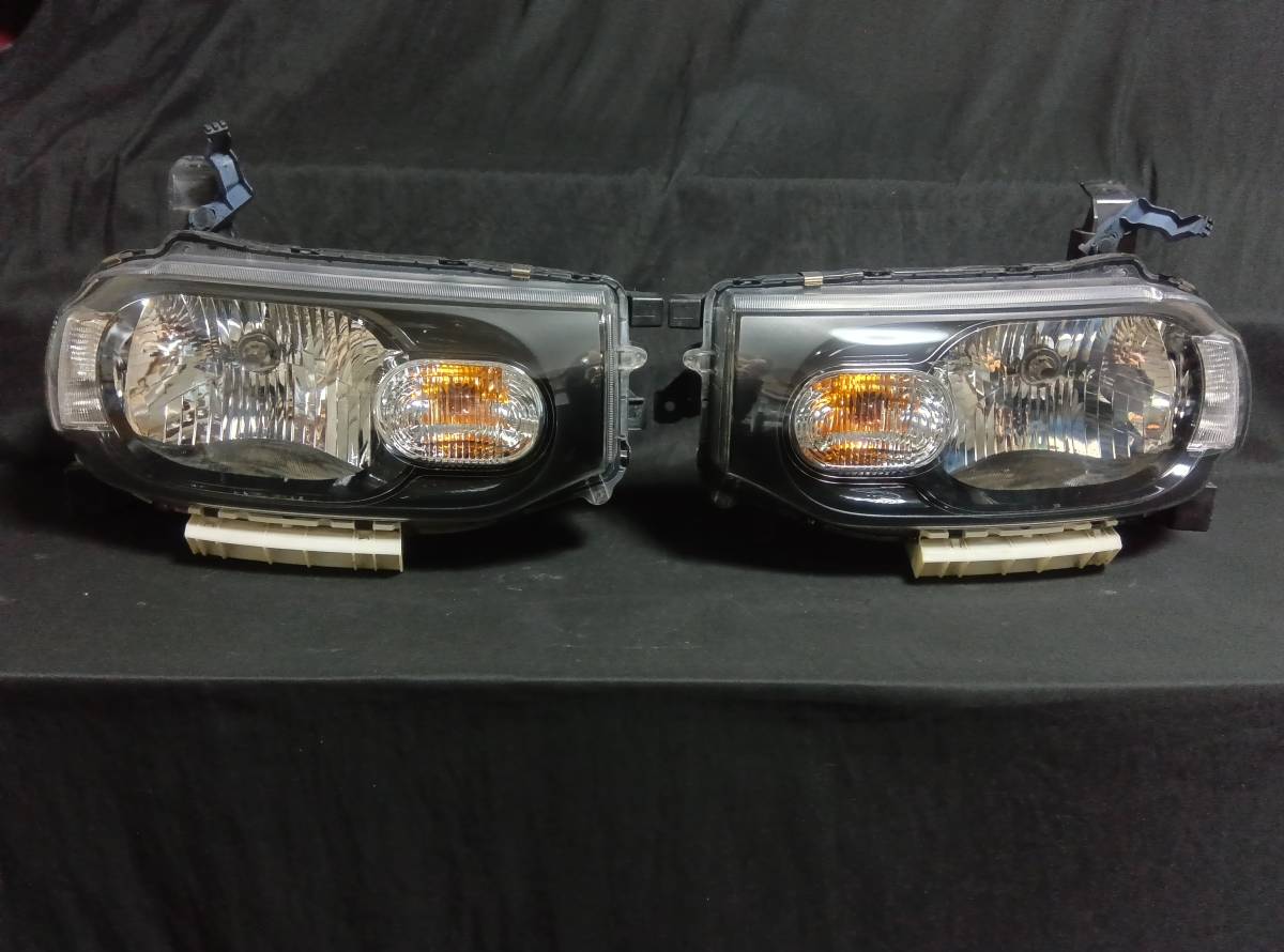 Yahoo!オークション - 3519 Z12 キューブ 日産 ハロゲンヘッドライト左...