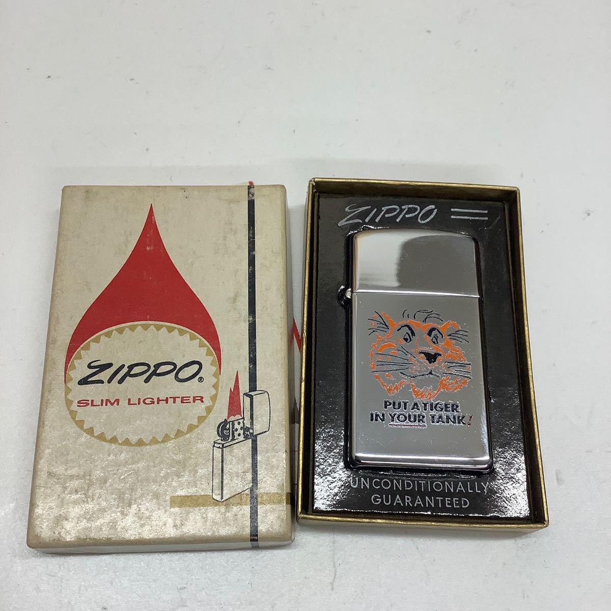 Yahoo!オークション - (26) ZIPPO ジッポ スリム 1969 PUT A TIGER IN ...