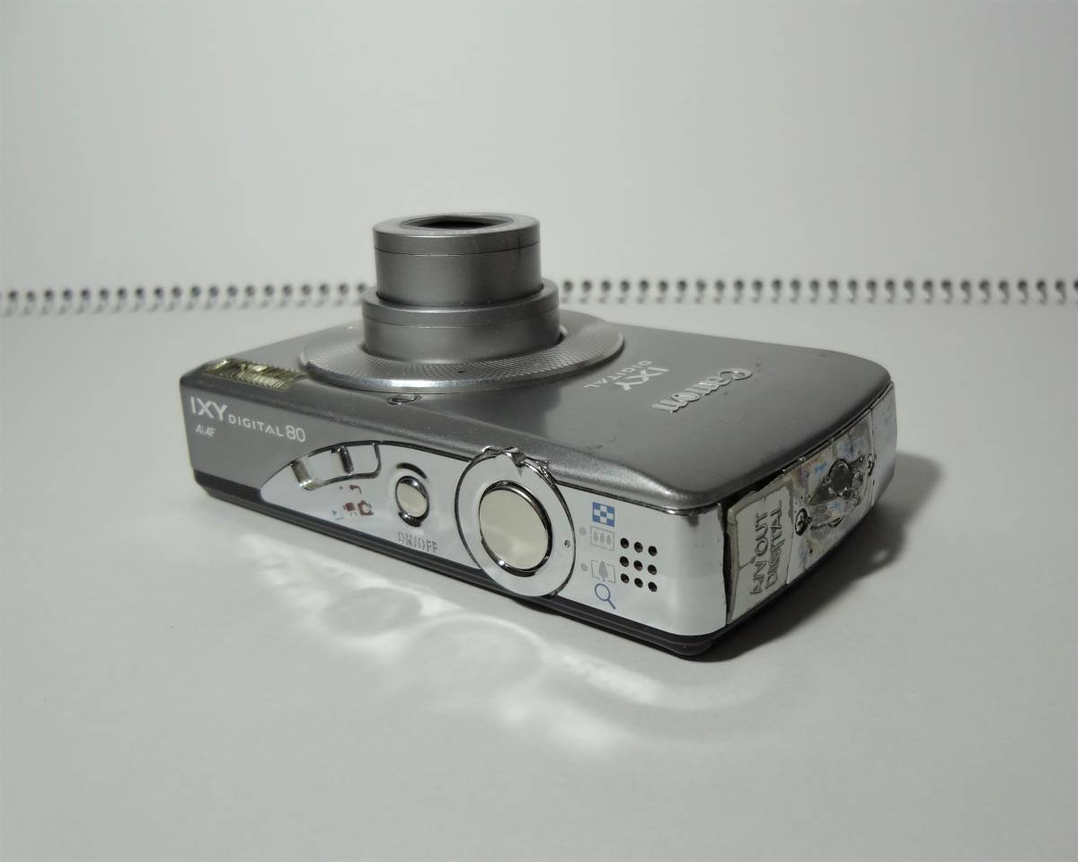 Canon IXY DIGITAL 80 (PC1147) exterior with defect Canon IXY DIGITAL 80 (PC1147) exterior with defect