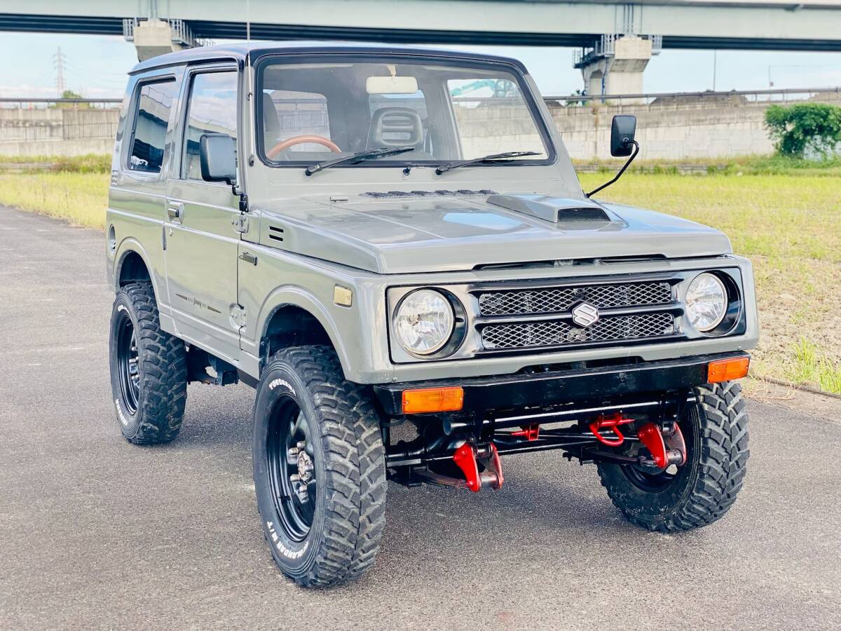 スズキ ジムニーバンJA11V改/ワイルドウウィンドリミテッド/ のミディアムグレー /車検R8年10月/4WD/5F/AC/PS/2インチリフトアップ(ジムニー)｜売買されたオークション情報 ...