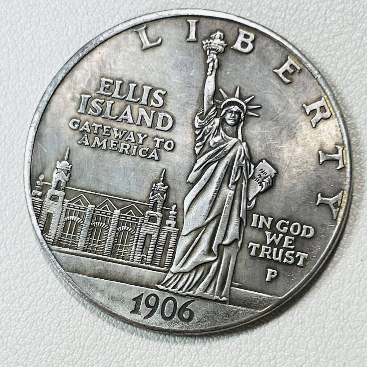 アメリカ 硬貨 古銭 エリス島 1906年 自由の女神 アメリカへの玄関口 松明 新たな巨像 銘 記念幣 コイン 重20.29g 銀貨(北アメリカ)｜売買されたオークション情報、yahooの ...