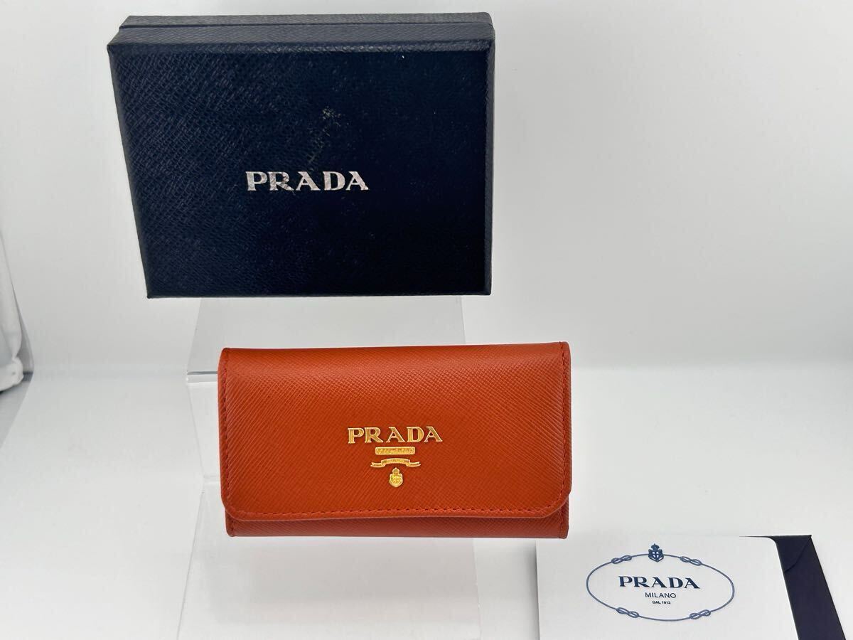Yahoo!オークション - M406 PRADA プラダ レザー 6連 キーケース オレ...