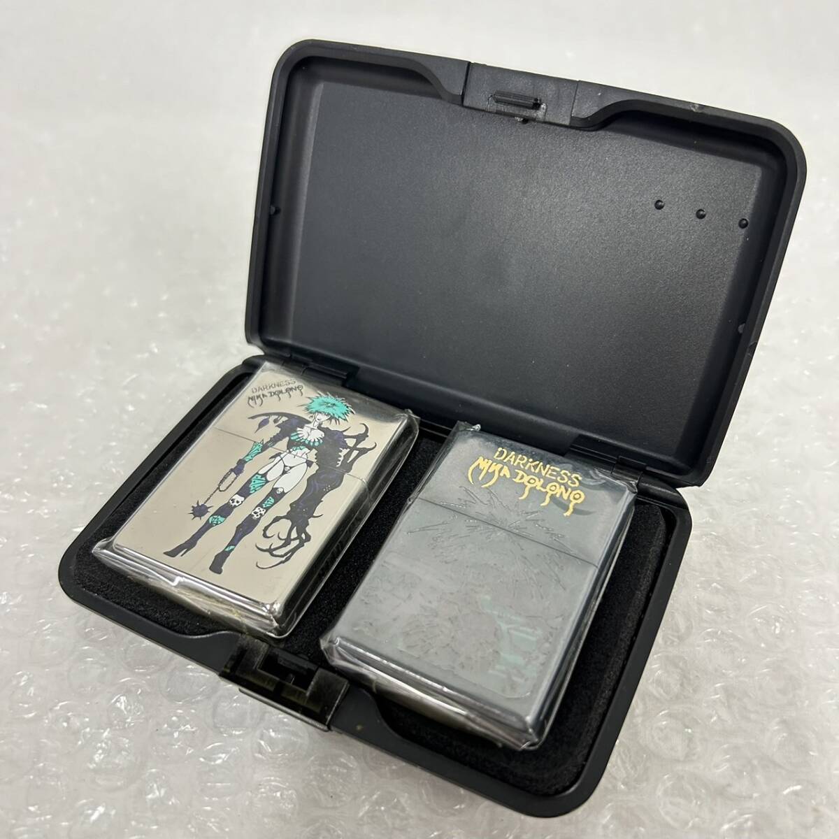 24名/A013357-10/J121-612/KK12000【名古屋】ZIPPO 韮沢 靖 Yasushi NIRAsawa WORLD NINA DOLONO プラチナ鏡面 / ニッケル燻 ...