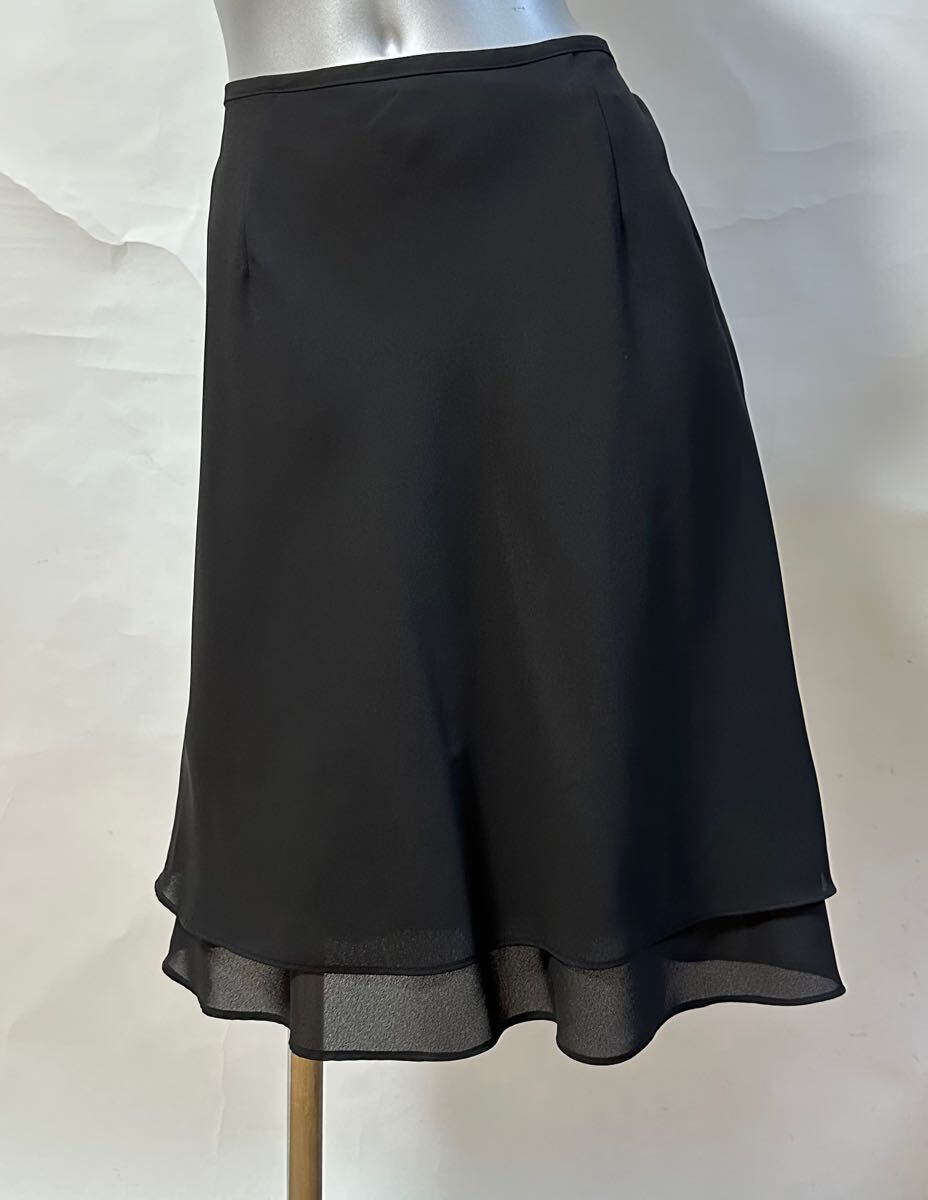 Yahoo!オークション - W70 H95 新品 黒のスカート・XL